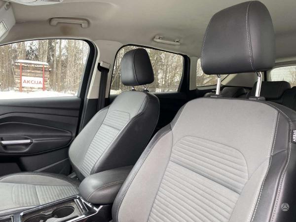 Black Ford Kuga 2017 in Panevezys, with an engine capacity of 2.00 L and mileage of 295 thousand km for 8800 €, photo 11 on AUTOMOTO.COM.LV