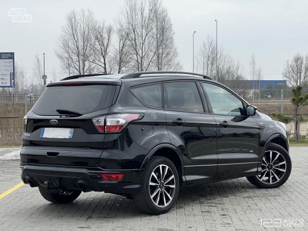 Black Ford Kuga 2017 in Taurage, with an engine capacity of 2.00 L and mileage of 203 thousand km for 10300 €, photo 9 on AUTOMOTO.COM.LV