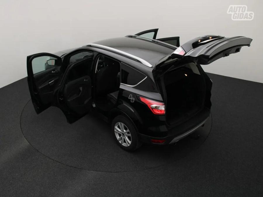 Black Ford Kuga 2017 in Vilnius, with an engine capacity of 1.50 L and mileage of 141 thousand km for 10099 €, photo 14 on AUTOMOTO.COM.LV