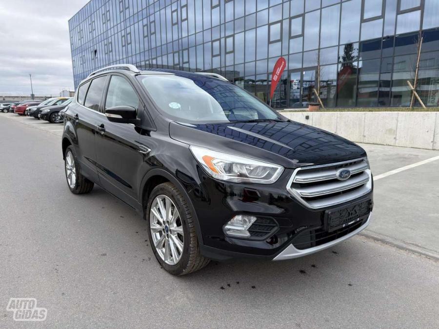 Black Ford Kuga 2017 in Kaunas, with an engine capacity of 2.00 L and mileage of 295 thousand km for 8200 €, photo 1 on AUTOMOTO.COM.LV