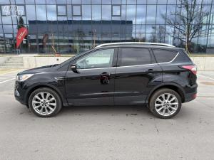 Black Ford Kuga 2017 in Kaunas, with an engine capacity of 2.00 L and mileage of 295 thousand km for 8200 €, photo 12 on AUTOMOTO.COM.LV