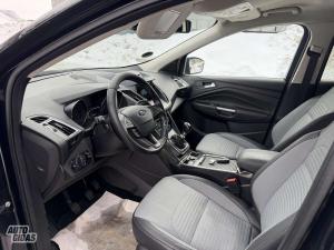 Black Ford Kuga 2017 in Kaunas, with an engine capacity of 2.00 L and mileage of 295 thousand km for 8200 €, photo 16 on AUTOMOTO.COM.LV