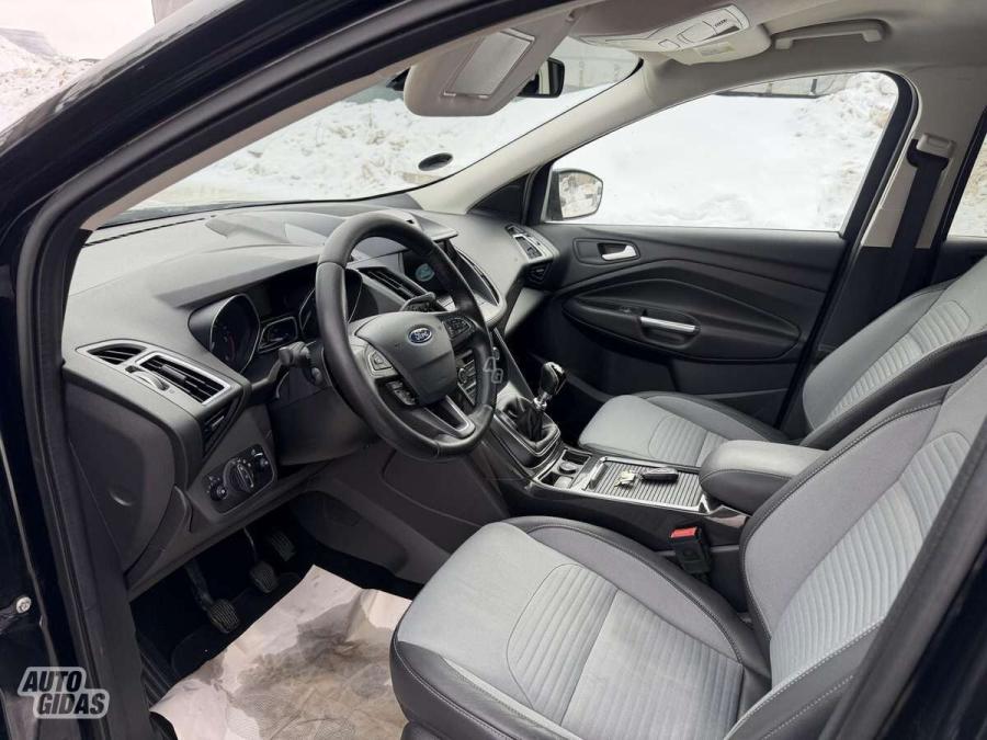 Black Ford Kuga 2017 in Kaunas, with an engine capacity of 2.00 L and mileage of 295 thousand km for 8200 €, photo 16 on AUTOMOTO.COM.LV