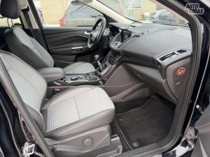 Black Ford Kuga 2017 in Kaunas, with an engine capacity of 2.00 L and mileage of 295 thousand km for 8200 €, photo 17 on AUTOMOTO.COM.LV