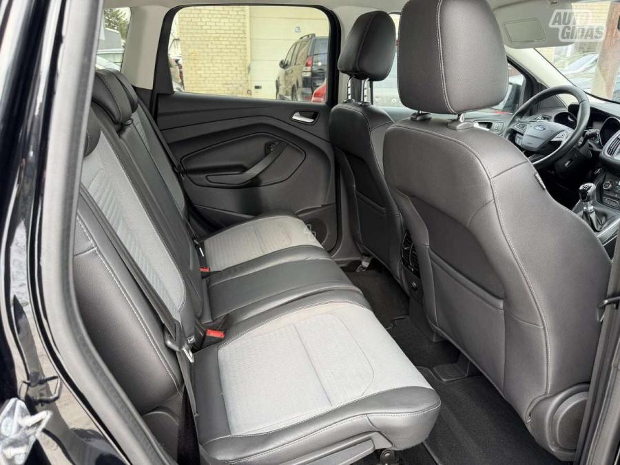 Black Ford Kuga 2017 in Kaunas, with an engine capacity of 2.00 L and mileage of 295 thousand km for 8200 €, photo 33 on AUTOMOTO.COM.LV