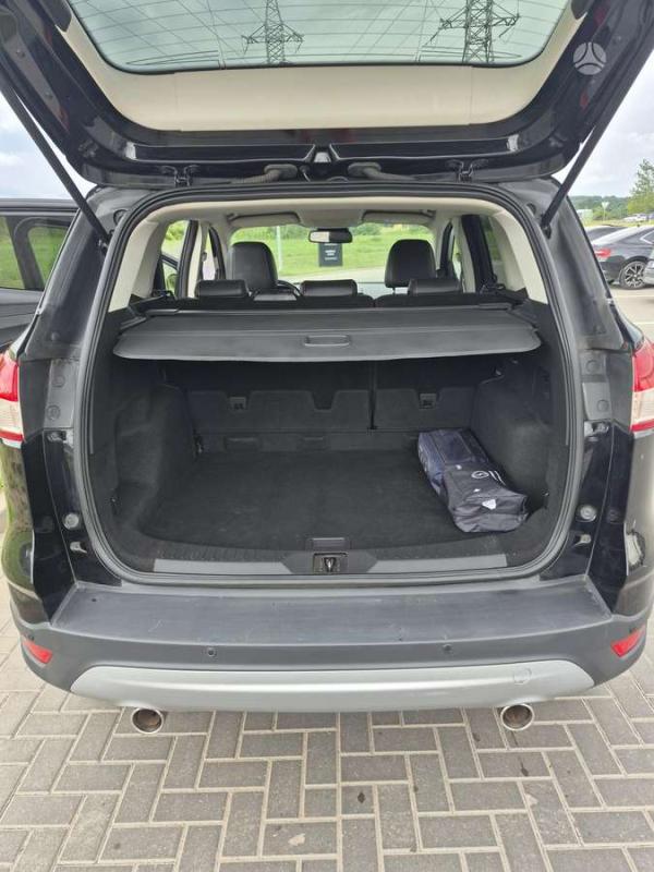 Black Ford Kuga 2017 in Kaunas, with an engine capacity of 2.00 L and mileage of 202 thousand km for 10200 €, photo 5 on AUTOMOTO.COM.LV