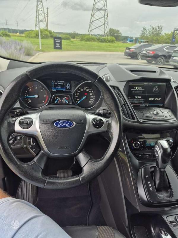Black Ford Kuga 2017 in Kaunas, with an engine capacity of 2.00 L and mileage of 202 thousand km for 10200 €, photo 6 on AUTOMOTO.COM.LV