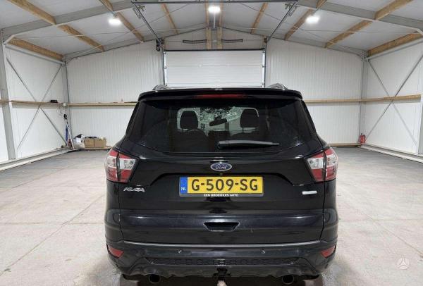 Black Ford Kuga 2017 in Kaunas, with an engine capacity of 1.50 L and mileage of 101 thousand km for 9900 €, photo 5 on AUTOMOTO.COM.LV