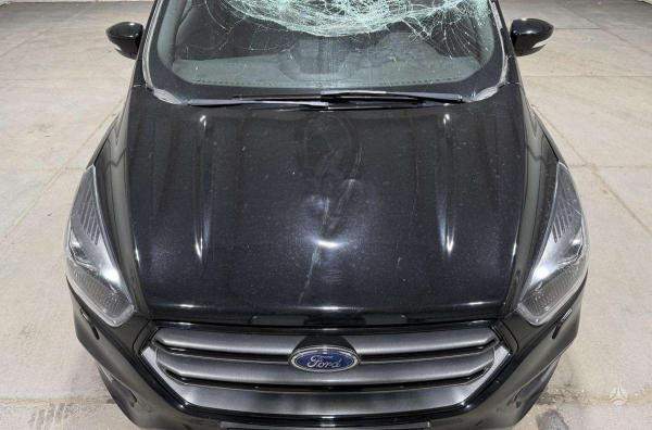 Black Ford Kuga 2017 in Kaunas, with an engine capacity of 1.50 L and mileage of 101 thousand km for 9900 €, photo 9 on AUTOMOTO.COM.LV