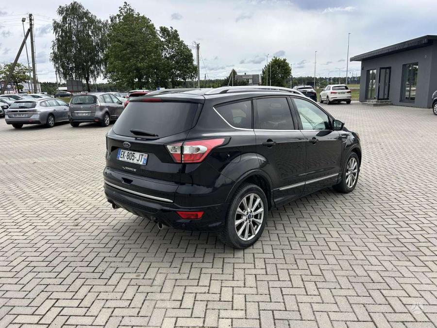 Black Ford Kuga 2017 in Taurage, with an engine capacity of 2.00 L and mileage of 285 thousand km for 9200 €, photo 5 on AUTOMOTO.COM.LV