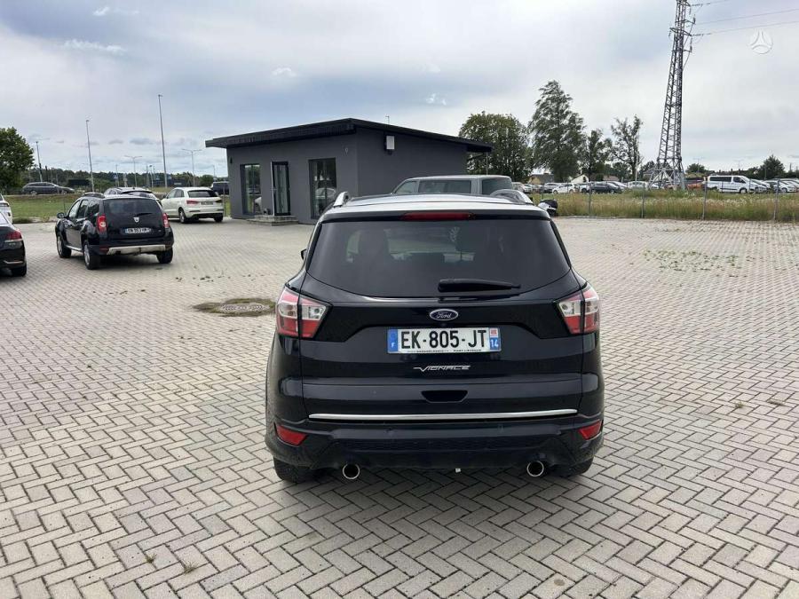Black Ford Kuga 2017 in Taurage, with an engine capacity of 2.00 L and mileage of 285 thousand km for 9200 €, photo 6 on AUTOMOTO.COM.LV