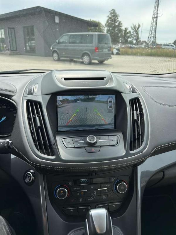 Black Ford Kuga 2017 in Taurage, with an engine capacity of 2.00 L and mileage of 285 thousand km for 9200 €, photo 11 on AUTOMOTO.COM.LV