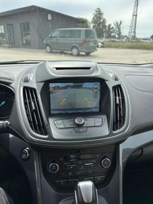 Black Ford Kuga 2017 in Taurage, with an engine capacity of 2.00 L and mileage of 285 thousand km for 9200 €, photo 11 on AUTOMOTO.COM.LV