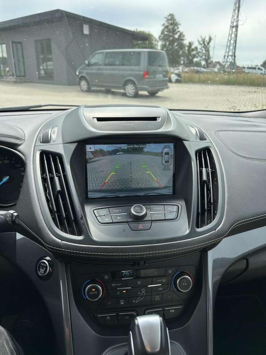 Black Ford Kuga 2017 in Taurage, with an engine capacity of 2.00 L and mileage of 285 thousand km for 9200 €, photo 11 on AUTOMOTO.COM.LV