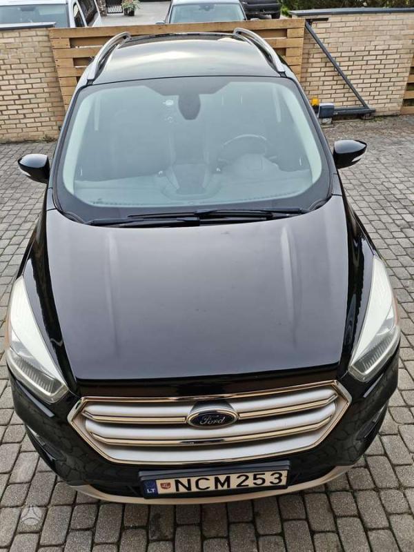 Black Ford Kuga 2017 in Silute, with an engine capacity of 1.50 L and mileage of 220 thousand km for 9400 €, photo 7 on AUTOMOTO.COM.LV