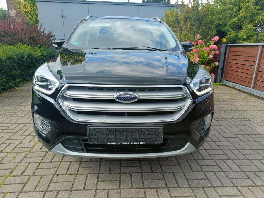 Black Ford Kuga 2017 in Vilnius, with an engine capacity of 1.50 L and mileage of 72 thousand km for 12500 €, photo 1 on AUTOMOTO.COM.LV