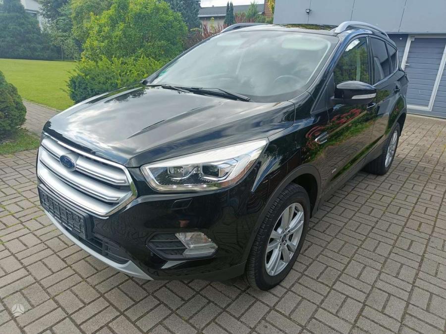 Black Ford Kuga 2017 in Vilnius, with an engine capacity of 1.50 L and mileage of 72 thousand km for 12500 €, photo 5 on AUTOMOTO.COM.LV