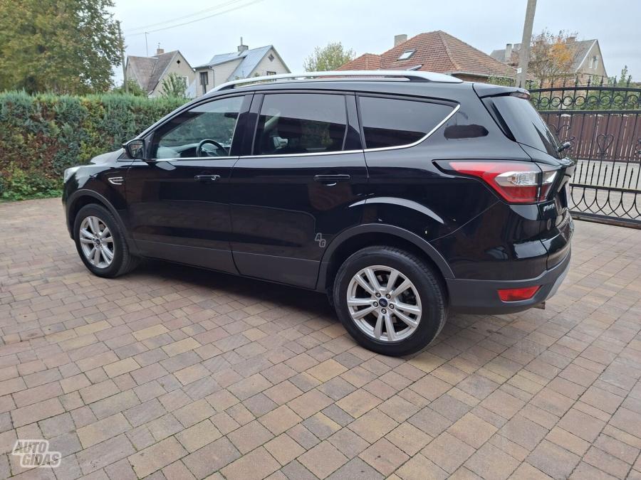 Black Ford Kuga 2017 in Kaunas, with an engine capacity of 1.50 L and mileage of 241 thousand km for 6300 €, photo 3 on AUTOMOTO.COM.LV
