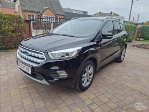 Black Ford Kuga 2017 in Kaunas, with an engine capacity of 1.50 L and mileage of 241 thousand km for 6300 €, photo 4 on AUTOMOTO.COM.LV