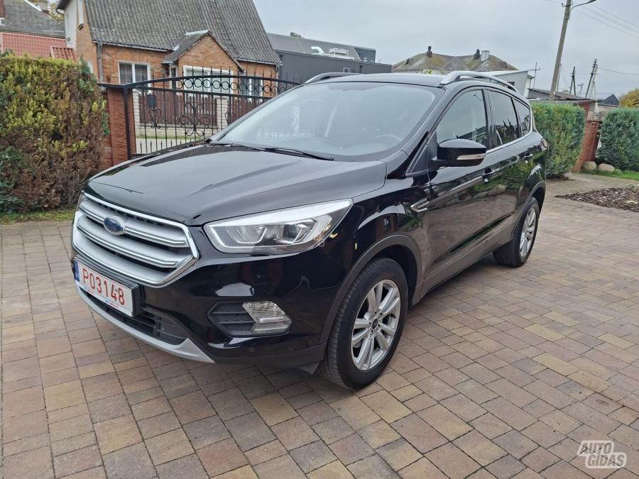 Black Ford Kuga 2017 in Kaunas, with an engine capacity of 1.50 L and mileage of 241 thousand km for 6300 €, photo 4 on AUTOMOTO.COM.LV