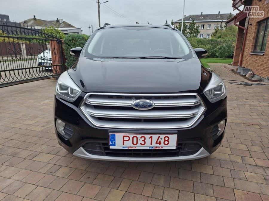 Black Ford Kuga 2017 in Kaunas, with an engine capacity of 1.50 L and mileage of 241 thousand km for 6300 €, photo 5 on AUTOMOTO.COM.LV