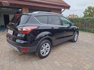 Black Ford Kuga 2017 in Kaunas, with an engine capacity of 1.50 L and mileage of 241 thousand km for 6300 €, photo 6 on AUTOMOTO.COM.LV