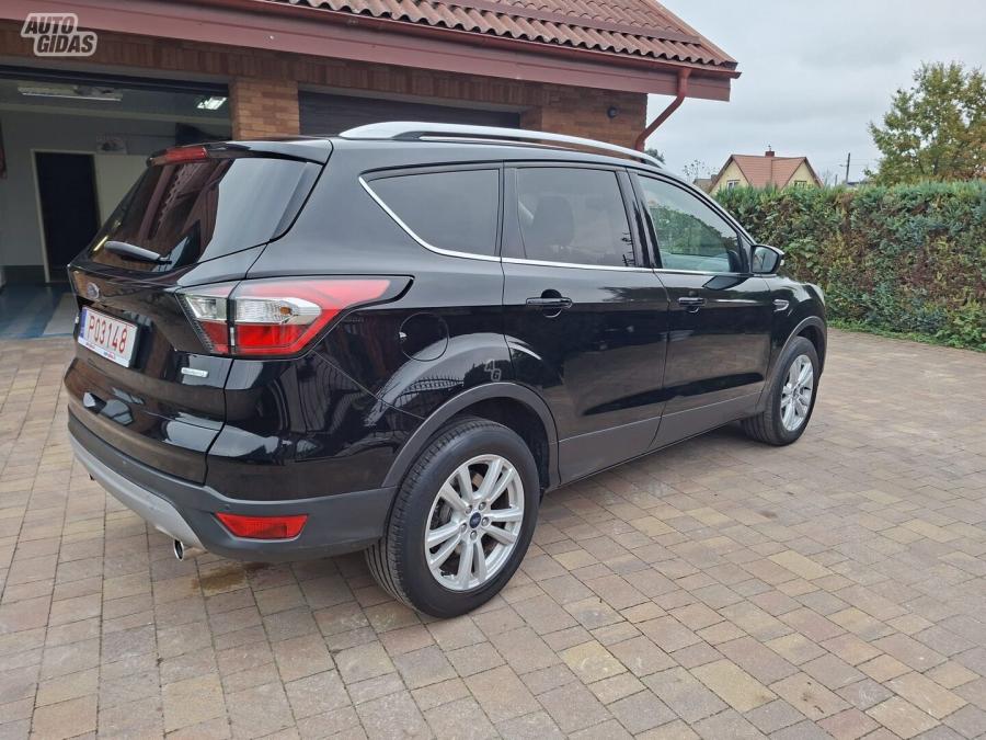 Black Ford Kuga 2017 in Kaunas, with an engine capacity of 1.50 L and mileage of 241 thousand km for 6300 €, photo 6 on AUTOMOTO.COM.LV