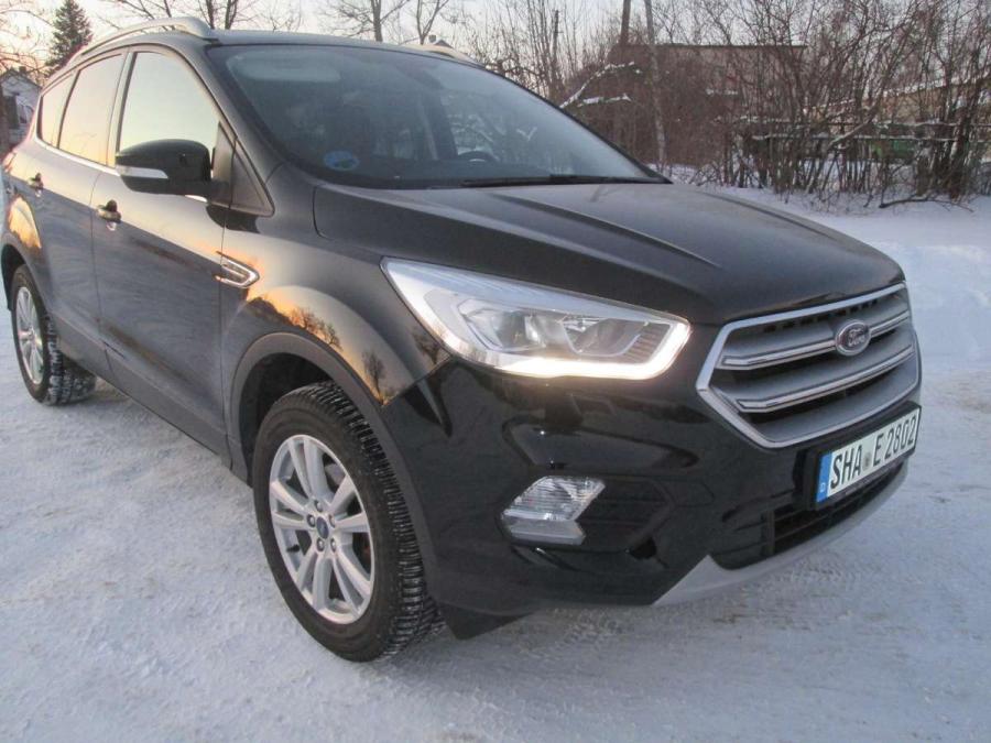 Black Ford Kuga 2018 in Kelme, with an engine capacity of 1.50 L and mileage of 31 thousand km for 14990 €, photo 1 on AUTOMOTO.COM.LV