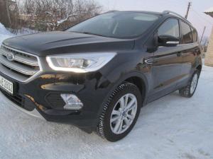Black Ford Kuga 2018 in Kelme, with an engine capacity of 1.50 L and mileage of 31 thousand km for 14990 €, photo 3 on AUTOMOTO.COM.LV