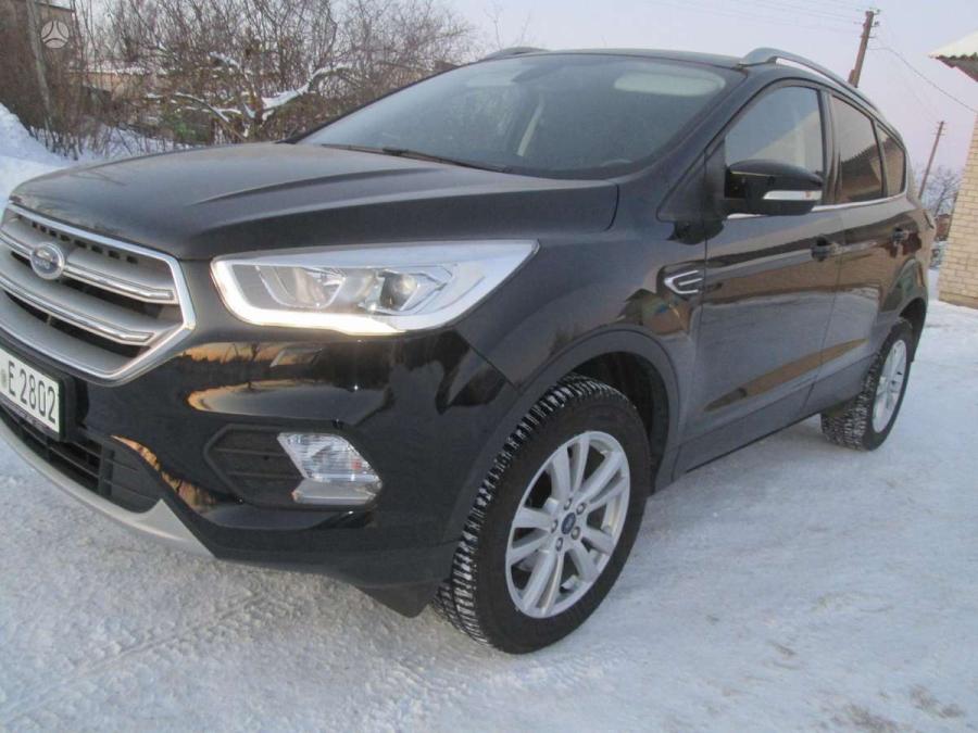 Black Ford Kuga 2018 in Kelme, with an engine capacity of 1.50 L and mileage of 31 thousand km for 14990 €, photo 3 on AUTOMOTO.COM.LV