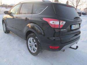Black Ford Kuga 2018 in Kelme, with an engine capacity of 1.50 L and mileage of 31 thousand km for 14990 €, photo 4 on AUTOMOTO.COM.LV