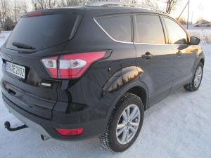 Black Ford Kuga 2018 in Kelme, with an engine capacity of 1.50 L and mileage of 31 thousand km for 14990 €, photo 5 on AUTOMOTO.COM.LV