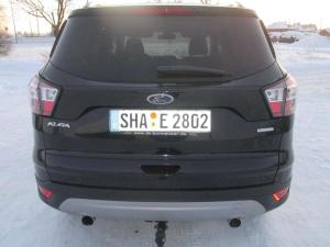 Black Ford Kuga 2018 in Kelme, with an engine capacity of 1.50 L and mileage of 31 thousand km for 14990 €, photo 7 on AUTOMOTO.COM.LV