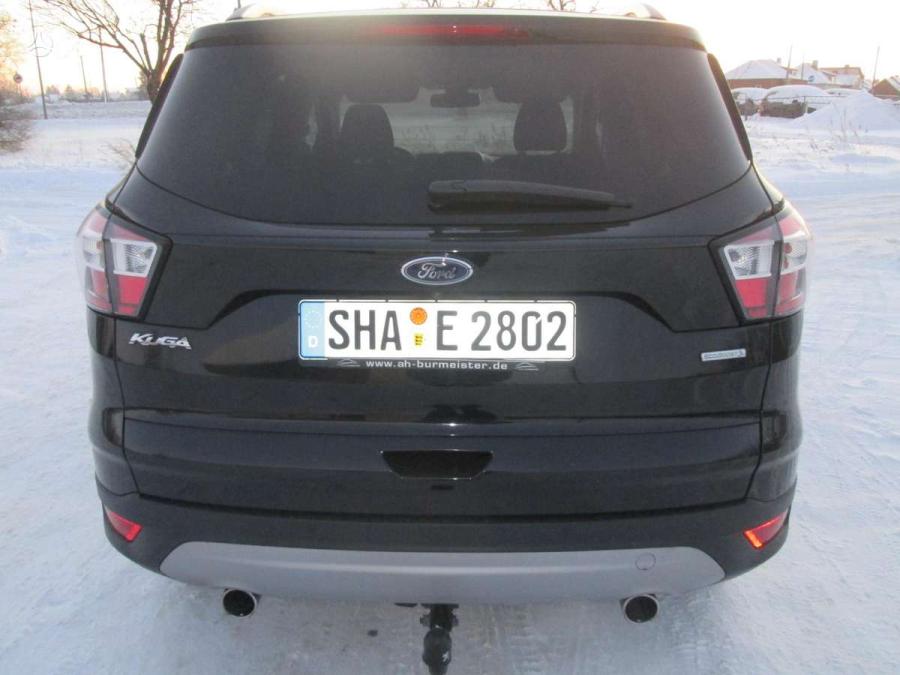 Black Ford Kuga 2018 in Kelme, with an engine capacity of 1.50 L and mileage of 31 thousand km for 14990 €, photo 7 on AUTOMOTO.COM.LV