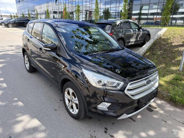 Black Ford Kuga 2018 in Panevezys, with an engine capacity of 2.00 L and mileage of 258 thousand km for 8850 €, photo 2 on AUTOMOTO.COM.LV