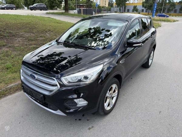Black Ford Kuga 2018 in Panevezys, with an engine capacity of 2.00 L and mileage of 258 thousand km for 8850 €, photo 4 on AUTOMOTO.COM.LV