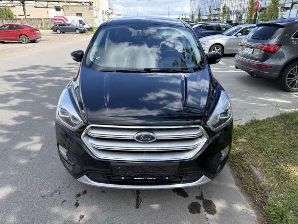 Black Ford Kuga 2018 in Panevezys, with an engine capacity of 2.00 L and mileage of 258 thousand km for 8850 €, photo 5 on AUTOMOTO.COM.LV