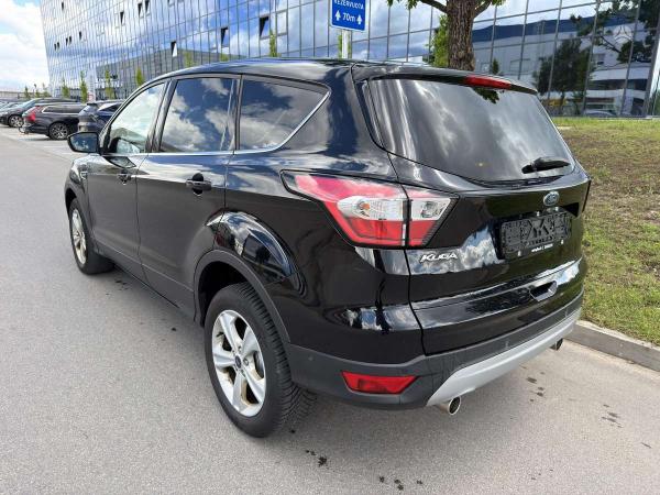 Black Ford Kuga 2018 in Panevezys, with an engine capacity of 2.00 L and mileage of 258 thousand km for 8850 €, photo 8 on AUTOMOTO.COM.LV