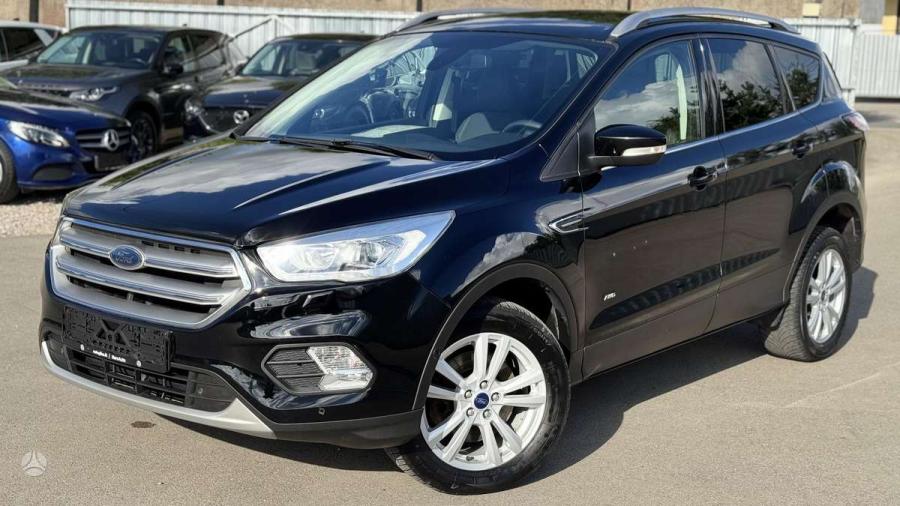 Black Ford Kuga 2018 in Telschi, with an engine capacity of 2.00 L and mileage of 198 thousand km for 10900 €, photo 3 on AUTOMOTO.COM.LV