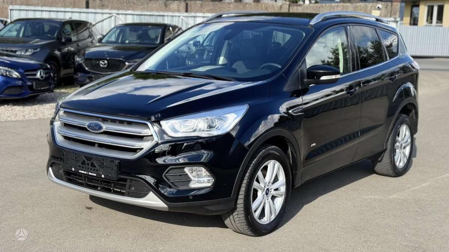 Black Ford Kuga 2018 in Telschi, with an engine capacity of 2.00 L and mileage of 198 thousand km for 10900 €, photo 6 on AUTOMOTO.COM.LV
