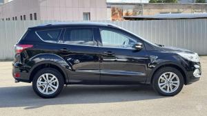 Black Ford Kuga 2018 in Telschi, with an engine capacity of 2.00 L and mileage of 198 thousand km for 10900 €, photo 10 on AUTOMOTO.COM.LV