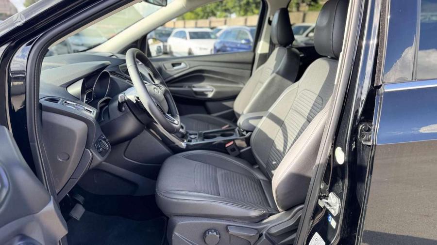 Black Ford Kuga 2018 in Telschi, with an engine capacity of 2.00 L and mileage of 198 thousand km for 10900 €, photo 13 on AUTOMOTO.COM.LV