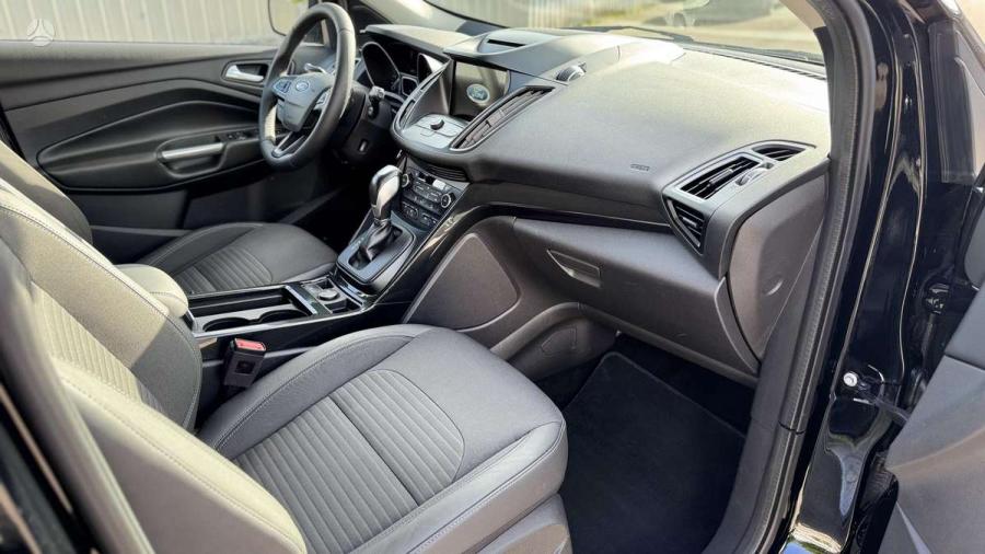 Black Ford Kuga 2018 in Telschi, with an engine capacity of 2.00 L and mileage of 198 thousand km for 10900 €, photo 15 on AUTOMOTO.COM.LV