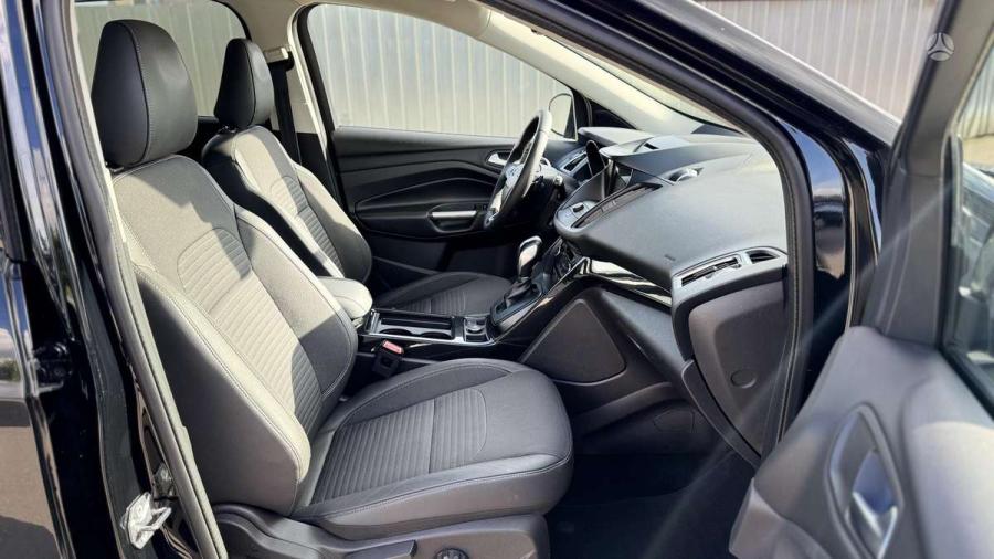 Black Ford Kuga 2018 in Telschi, with an engine capacity of 2.00 L and mileage of 198 thousand km for 10900 €, photo 16 on AUTOMOTO.COM.LV