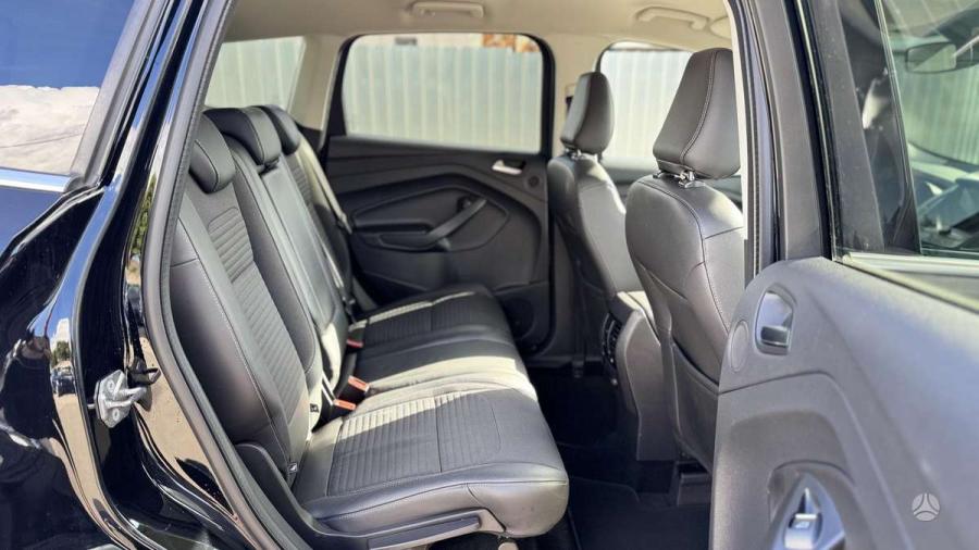 Black Ford Kuga 2018 in Telschi, with an engine capacity of 2.00 L and mileage of 198 thousand km for 10900 €, photo 17 on AUTOMOTO.COM.LV
