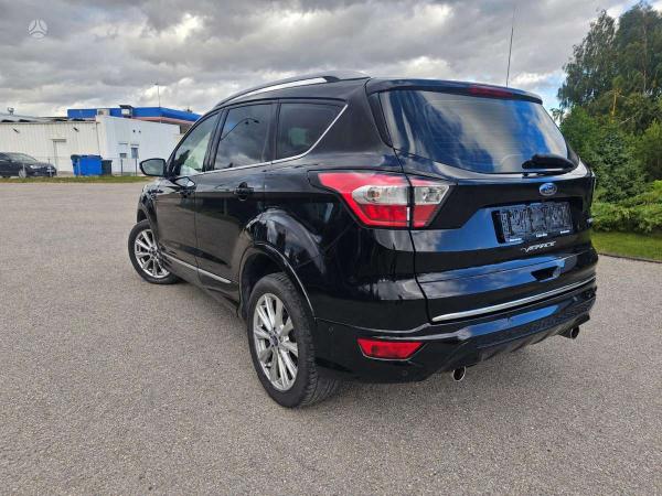 Black Ford Kuga 2018 in Pakruojis, with an engine capacity of 1.50 L and mileage of 195 thousand km for 9300 €, photo 6 on AUTOMOTO.COM.LV