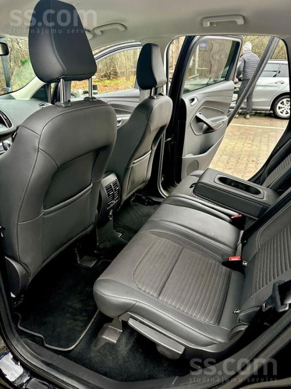 Black Ford Kuga 2018 in Riga, with an engine capacity of 2.00 L and mileage of 141 thousand km for 8750 €, photo 5 on AUTOMOTO.COM.LV
