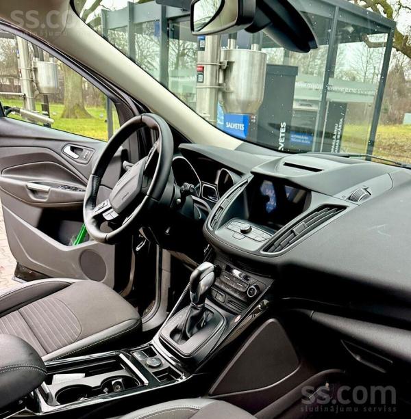 Black Ford Kuga 2018 in Riga, with an engine capacity of 2.00 L and mileage of 141 thousand km for 8750 €, photo 6 on AUTOMOTO.COM.LV