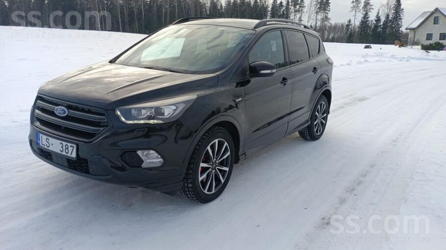 Black Ford Kuga 2019 in Riga, with an engine capacity of 2.00 L and mileage of 187 thousand km for 14500 €, photo 1 on AUTOMOTO.COM.LV
