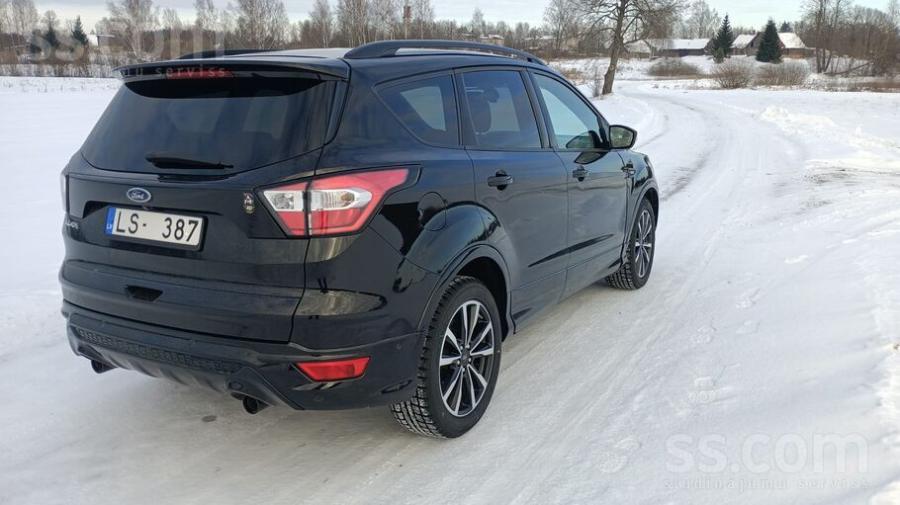 Black Ford Kuga 2019 in Riga, with an engine capacity of 2.00 L and mileage of 187 thousand km for 14500 €, photo 3 on AUTOMOTO.COM.LV